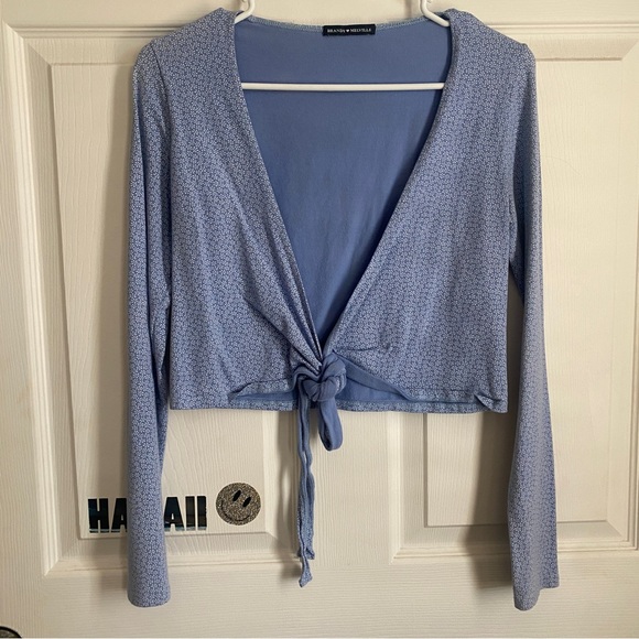 Brandy Melville | Tops | Brandy Melville Light Blue Coco Wrap Top ...